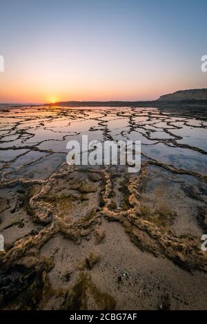 Seascape of Vila Nova Milfontes during low tide, at sunset Stock Photo ...