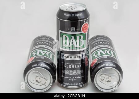 Three green cans of beer. Background for a pub. Beer store. Relax at ...