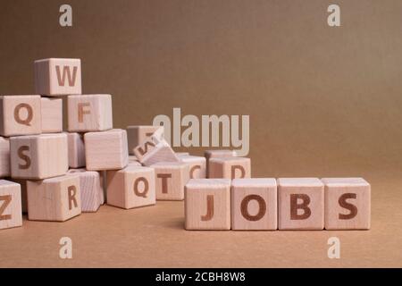 JOBS word made with building blocks. Employment salary skills concept ...