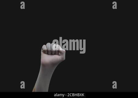 Hand in medical glove is clenched into a fist. gesturing hand in white ...