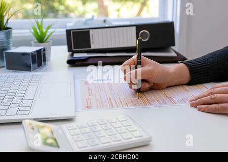 Australian tax form with pen, calculator and australian dollars Stock ...