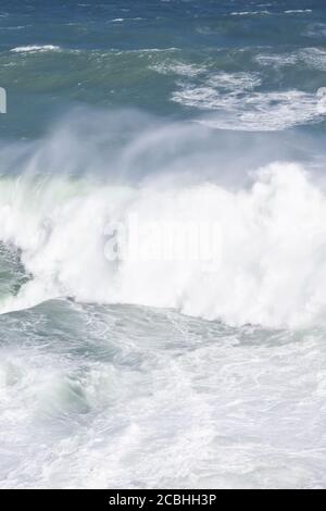 Foamy stong waves crashing in the ocean Stock Photo - Alamy