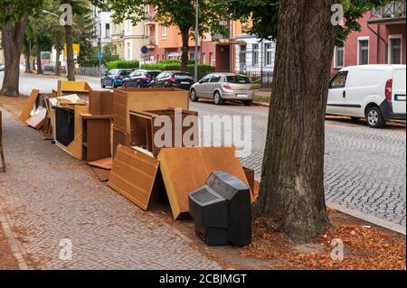 Bulky waste on the roadside Stock Photo - Alamy