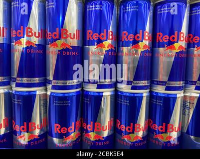 A display of Red Bull cans in a cooling shelf in a supermarket Stock ...