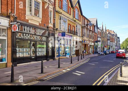 Regent Street with shops and traditional shop fronts in Rugby ...