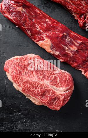 raw tri-tip steaks and roast on parchment paper Stock Photo - Alamy