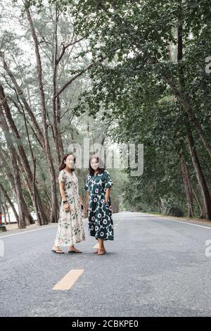 Portrait, Beautiful and charming Asian aged woman in casual clothes ...