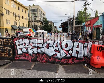 Seattle, USA – Jun 11, 2020: CHAZ sign on the East Precinct late in the ...