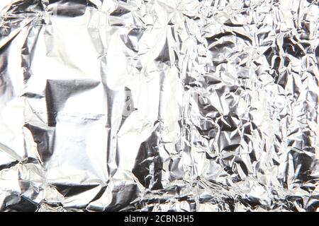 Scrunched shiny aluminum foil surface Stock Photo - Alamy