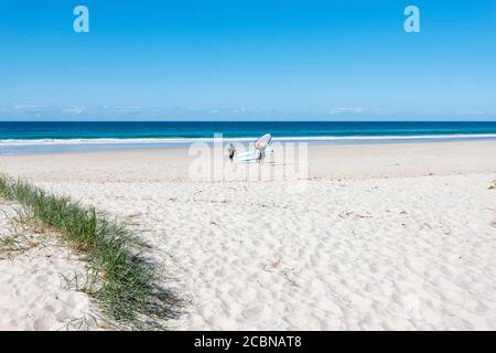A high angle shot of the beautiful rocky seashore of Hawaii at sunset ...