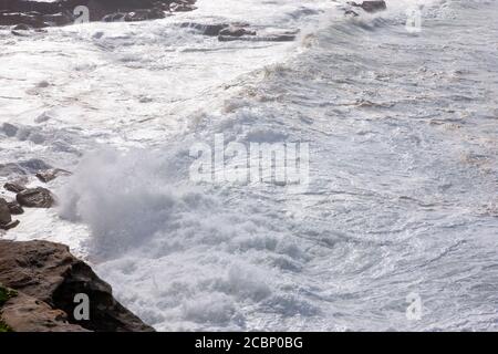 Foamy stong waves crashing in the ocean Stock Photo - Alamy