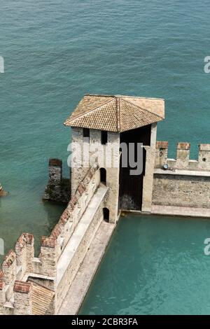 Backwater inside the Scaliger Castle - medieval port fortress, Sirmione ...