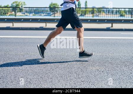 Overweight man running on road - concept of fat man fitness - obese ...