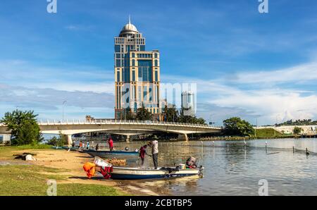 Fishing community and local community come together selling fish next ...