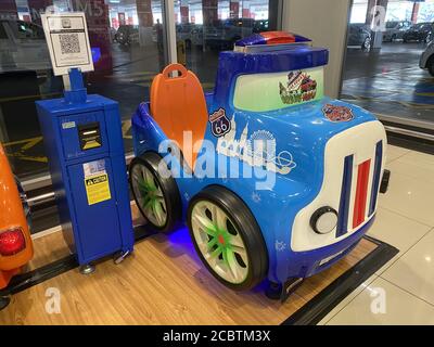 Penang, Malaysia - August 16, 2020 : View of a motor boat kiddie ride ...