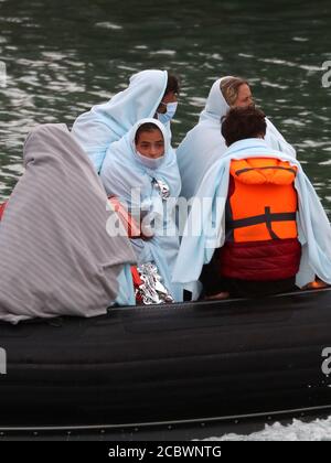 People thought to be migrants onboard a small boat in Gravelines ...