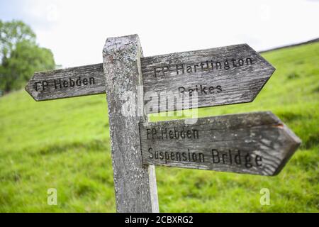 Hebden Bridge wooden signpost Stock Photo - Alamy