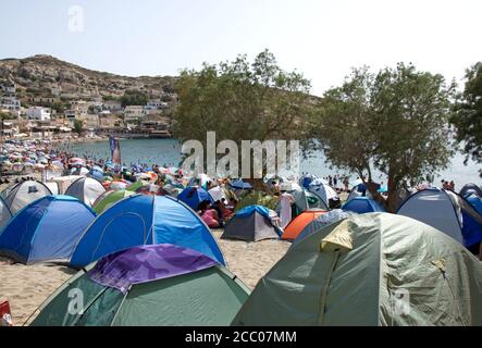Traditional hippie festival on the extraordinary beach of Matala in ...