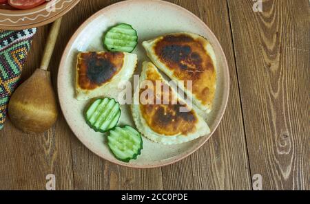 Sha Phaley, Tibetan dish of bread stuffed with seasoned red meat Stock ...