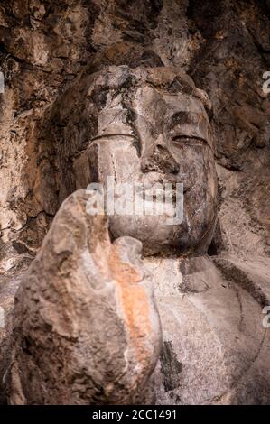 Head of Bouddha statue in Longmen caves, Luoyang, Henan, China Stock ...