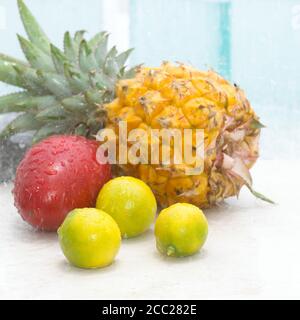 Close up tropic fruits lime on the wood table Stock Photo - Alamy