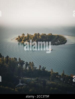 An aerial view of the beautiful Worthersee on a cloudy day in ...