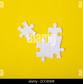 A partially completed jigsaw puzzle on a board Stock Photo - Alamy