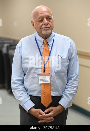 Broward County Supervisor of Elections Peter Antonacci looks over the ...