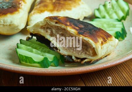 Sha Phaley, Tibetan dish of bread stuffed with seasoned red meat Stock ...