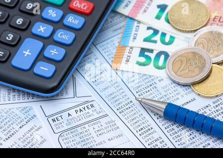 French payroll with income tax deduction. Close-up on the "net salary ...