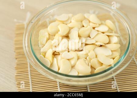 Bowl of white beans without skin Stock Photo - Alamy