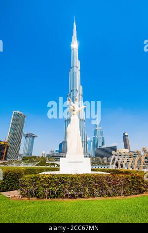 Three finger statue in Burj Khalifa Park in Dubai Stock Photo - Alamy