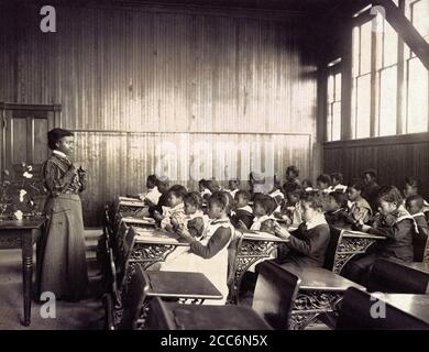 Vintage classroom of school children at desks circa 1890s Stock Photo ...