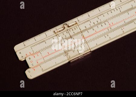 Logarithmic ruler on a colored background. Stationery for engineers and ...