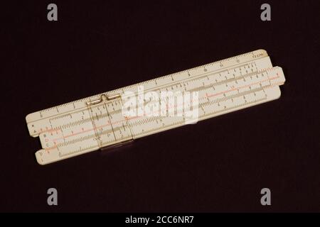 Logarithmic ruler on a colored background. Stationery for engineers and ...
