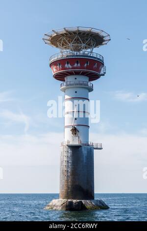 Irbe lighthouse in Baltic sea Stock Photo - Alamy