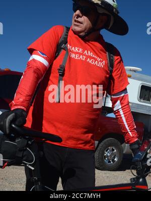President Donald Trump rides in the presidential limousine known as ...