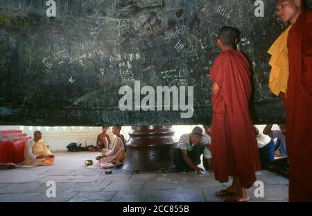 Buddhist monk ringing giant bell in Dai Garan at Kongobuji (Temple of ...