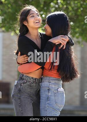 Twins Esha (left) and Risha Gupta get their GCSE results at The Grammar ...