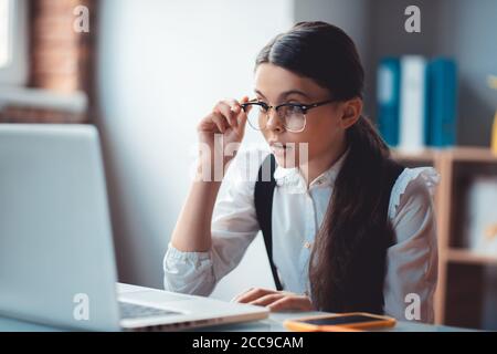 Shocked and impressed brunette girl looking amazed at smartphone screen Stock Photo - Alamy