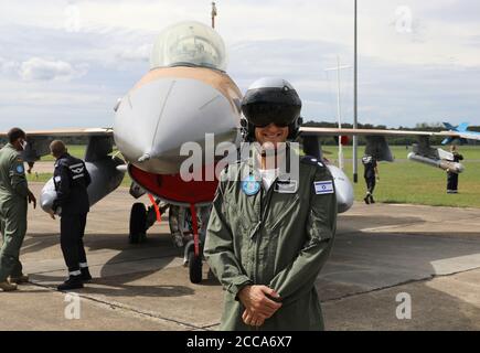 An Israeli pilot with a F-16 fighter jet in a hangar at Hatzor Israeli ...