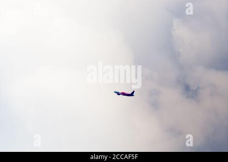 air plane escaping from a storm Stock Photo - Alamy