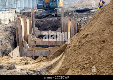 Two-sided mechanical excavation support system, excavation safety ...