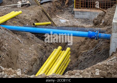 Junction of plastic sewer pipes. Sewage pipeline system of residential ...