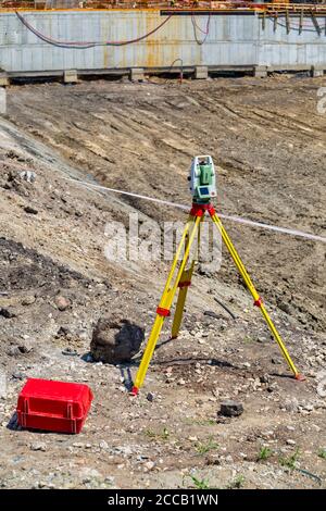 Total station. Survey Instrument geodetic device, total station set in ...