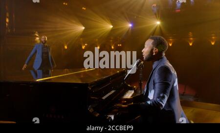 Singer John Legend and rapper Common perform during the dedication ...