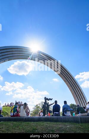 A bronze statue depicting Russian and Ukrainian workers holding up the ...
