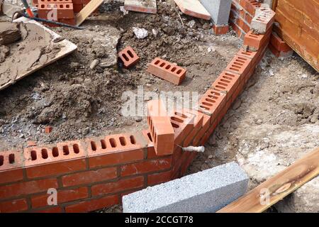 close up of concrete and brick foundation for conservatory base for ...