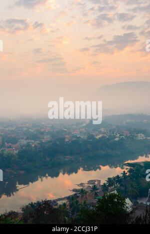 Sunrise and mist over Luang Prabang from Mount Phousi Stock Photo - Alamy