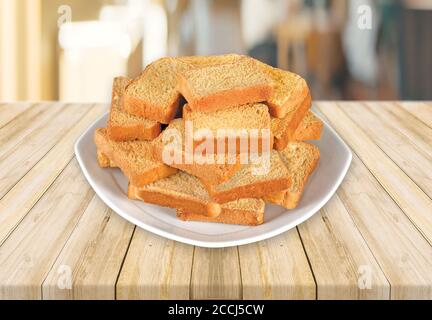 rusk, toast, milk toast, wheat toast with tea Stock Photo - Alamy